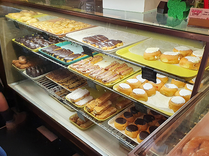 Treasure behind glass! Nord's display case showcases an edible art gallery where each tray holds the potential to ruin your diet and make your day simultaneously.