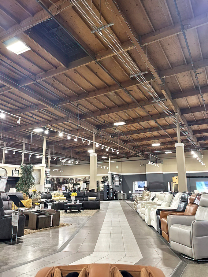 Exposed wooden beams create an industrial-chic backdrop for rows of recliners that promise to solve all of life's problems—or at least make them more comfortable.