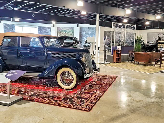 This isn't just a car on display; it's a blue beauty holding court on a Persian rug like automotive royalty.