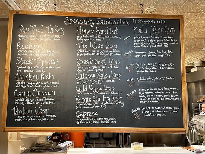 That chalkboard menu is like a roadmap to sandwich nirvana. The Stuffed Turkey sits proudly at the top-left corner&mdash;not a coincidence, folks.