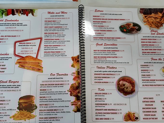 The spiral-bound menu reads like a love letter to American comfort food classics, each page a roadmap to culinary satisfaction.