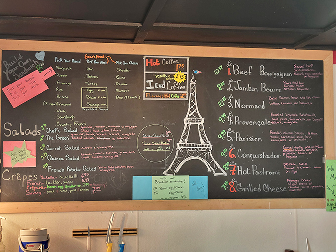 This menu board deserves an art gallery showing. The hand-drawn Eiffel Tower is basically saying, "Your sad desk lunch could have been me."