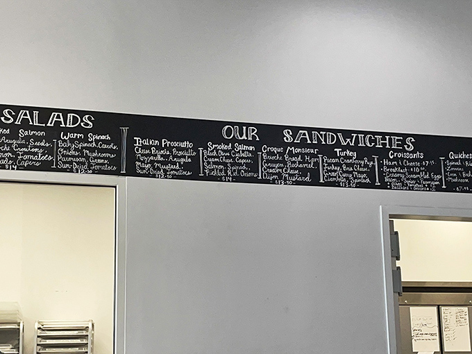 That chalkboard menu isn't just listing sandwiches—it's offering life choices. Each option more tempting than the last.