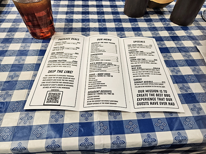 A menu that doesn't mince words, just like the meat. "Our mission is to create the best BBQ experience" isn't just marketing—it's a solemn promise to your taste buds.