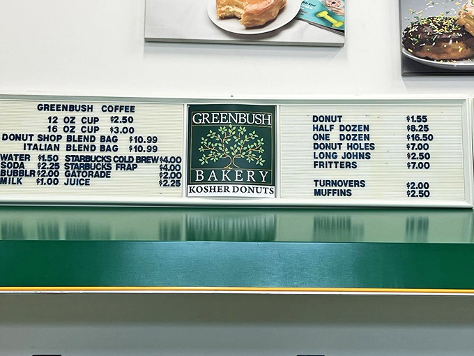 The menu board at Greenbush speaks the universal language of donut mathematics: one is never enough, a dozen barely makes it home. 