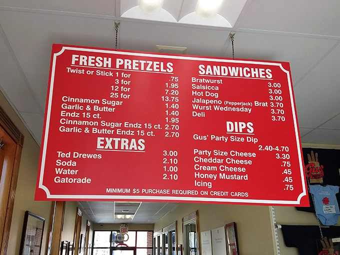 This menu board is like the Dead Sea Scrolls of dough – ancient wisdom revealing the path to pretzel enlightenment.