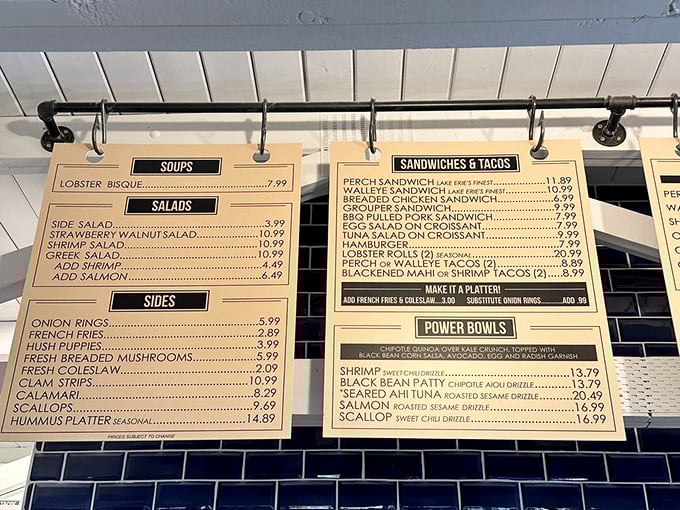 The menu board at Jolly Roger&mdash;a maritime treasure map where X marks the spot for perch sandwiches. No fancy descriptions needed when the food speaks this loudly.