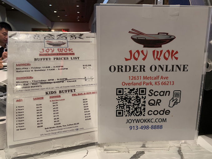 The menu board reveals the buffet's secret weapon &ndash; reasonable prices that let you sample everything without selling your firstborn to fund your crab leg addiction.