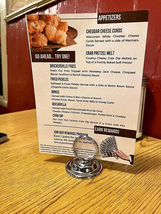 The appetizer menu reads like a greatest hits album of American comfort cuisine. Cheddar cheese curds? Crab pretzel melt? Yes, please!