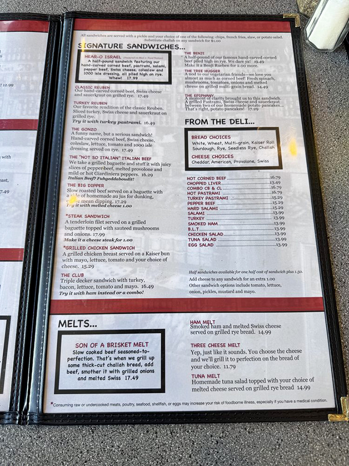 A menu that reads like poetry to deli aficionados. Each sandwich description promises a journey to flavor town.