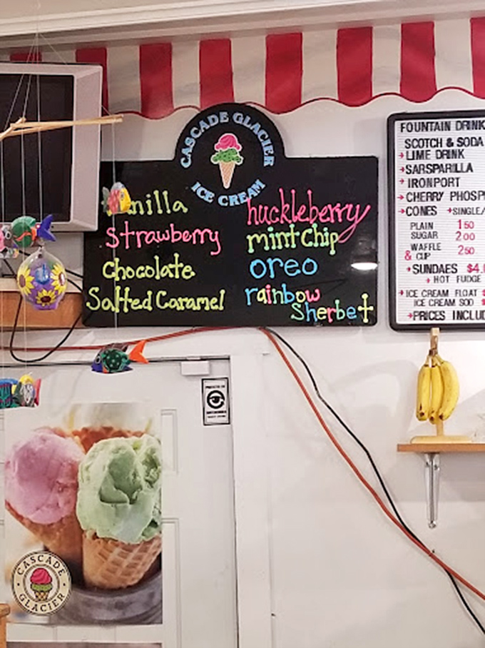 The chalkboard menu reads like a poem to ice cream lovers. Huckleberry stands out in vibrant purple, beckoning you closer.