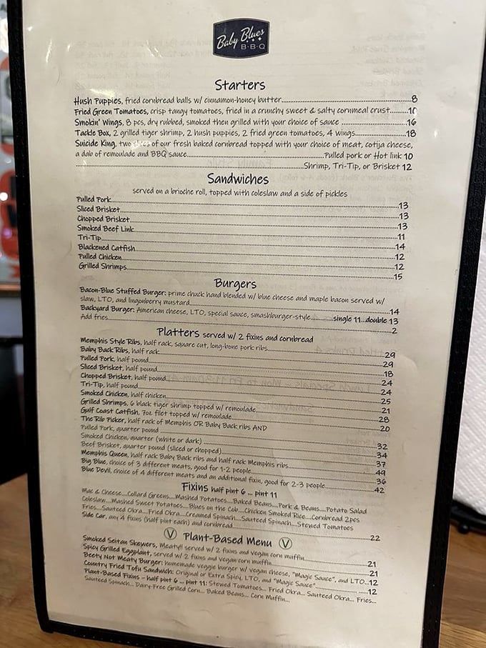 A menu that reads like a love letter to American barbecue traditions, offering everything from Memphis-style ribs to Texas brisket under one roof.