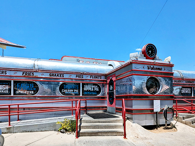 The 5 & Diner gleams like a chrome time machine. This retrofitted wonderland serves nostalgia on a plate (with extra whipped cream).