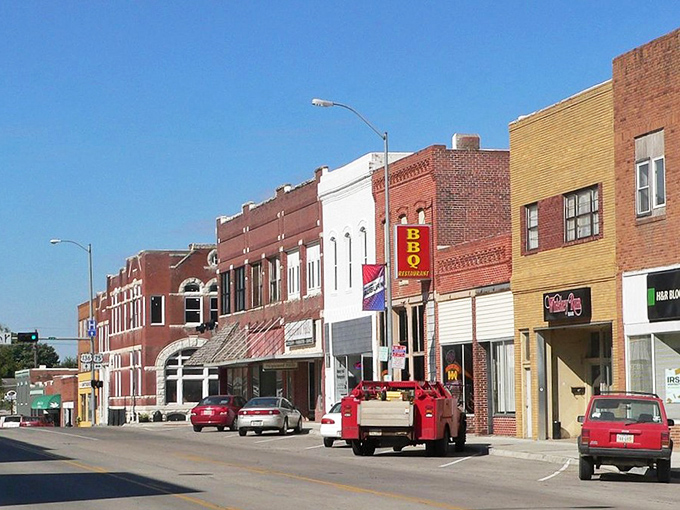 Auburn's colorful downtown buildings look like they're competing in a "Most Charming Facade" contest – and everyone's winning!