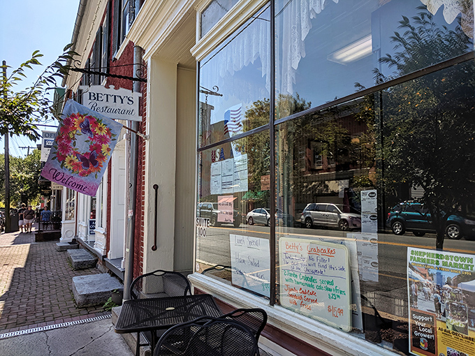 Betty's Restaurant's charming storefront is a portal to simpler times. That welcome flag isn't just decoration&mdash;it's a breakfast battle standard!