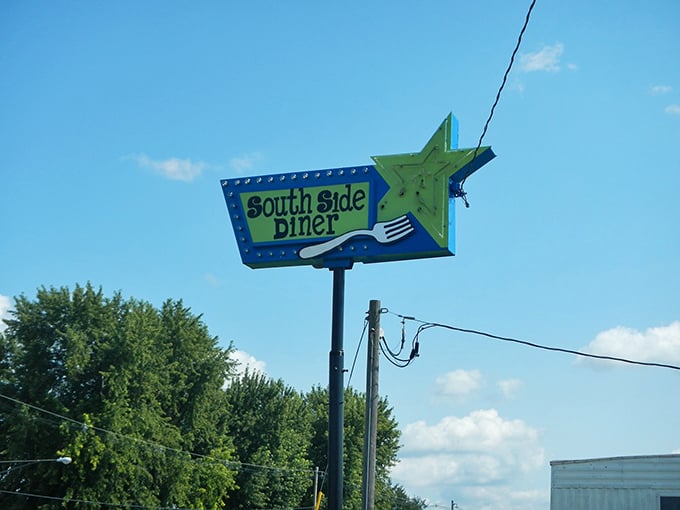 That green star sign is like a beacon guiding hungry travelers to breakfast paradise. Follow it to pancake nirvana!