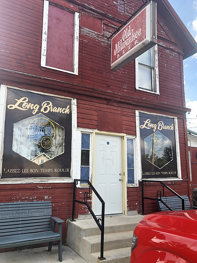 The weathered red siding of Longbranch Restaurant looks like a movie set, but the steaks inside are the real stars of this show.