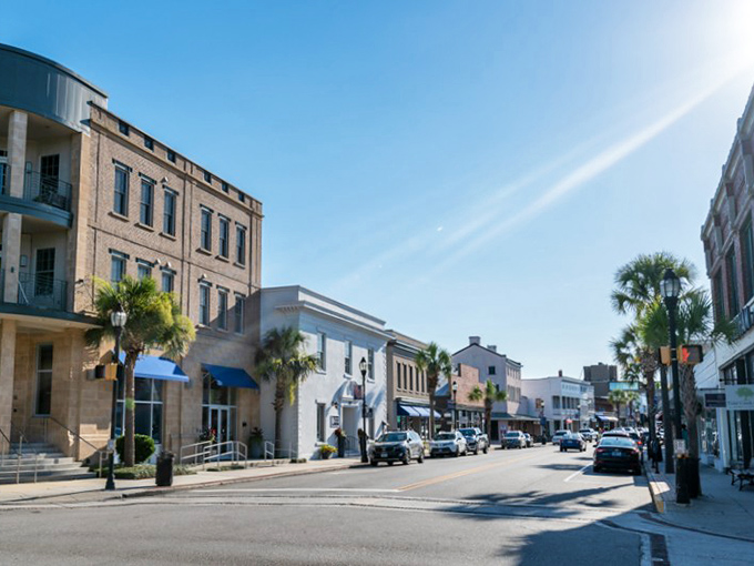 Palm trees stand sentinel along Beaufort's waterfront streets, where history and coastal charm create the perfect Southern cocktail.