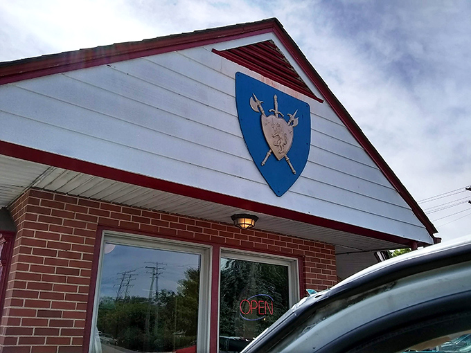 Behind that shield emblem lies a kingdom of breakfast delights. Canterbury Palace stands ready to serve its loyal subjects.