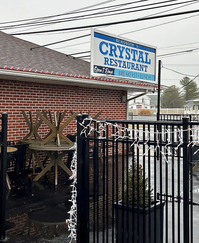 The "OPEN" sign glows like a beacon of hope for those who understand that vacation calories don't count, especially before noon.