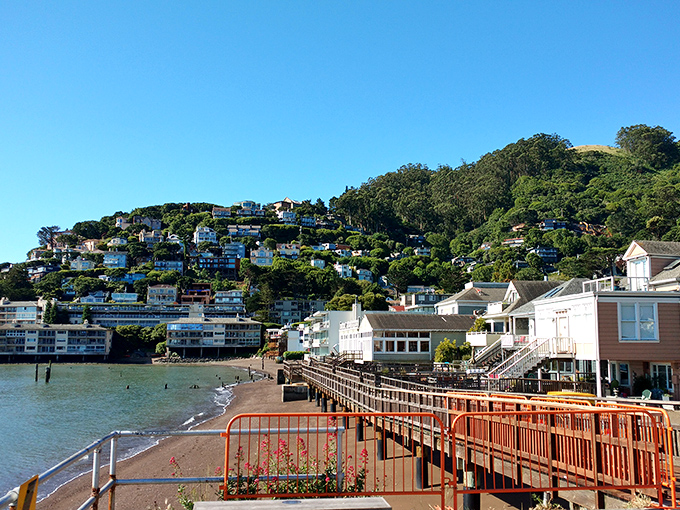 The waterfront promenade offers million-dollar views where neighbors gather daily, proving the best things in life&mdash;friendship and scenery&mdash;are actually free.