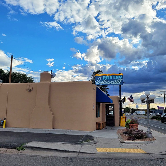 Blue skies and adobe walls &ndash; this unassuming building houses some of Santa Fe's most legendary green chile creations.