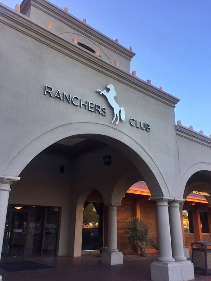 White horse logo, stately columns—this isn't just dinner, it's an event. Your steak awaits its grand entrance.
