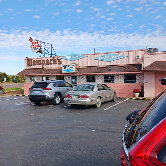 Wampach's from parking lot: "Under that retro sign lies a breakfast paradise where hash browns achieve that mythical crispy-yet-tender perfection. Morning magic!"