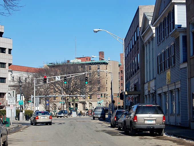 A quiet Waterbury street showcases the city's architectural character, where brick buildings tell stories of Connecticut's industrial past.