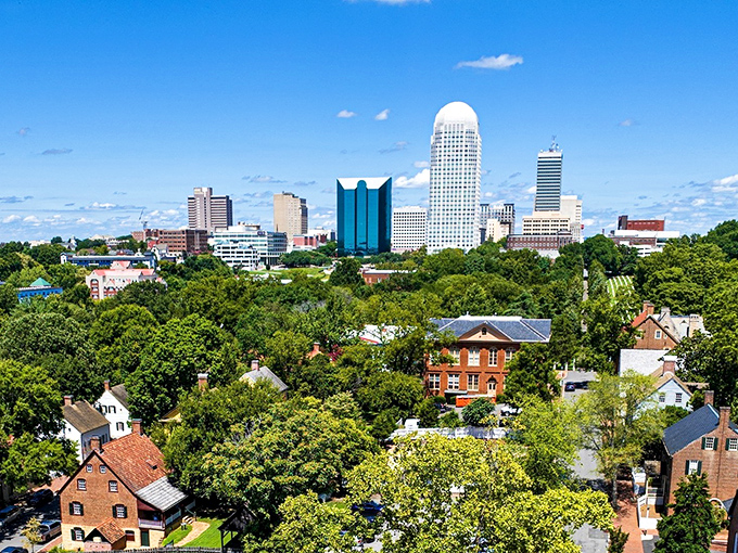 Winston-Salem's skyline at dusk offers big-city amenities with small-town prices. Those lights don't translate to high electric bills for savvy retirees.