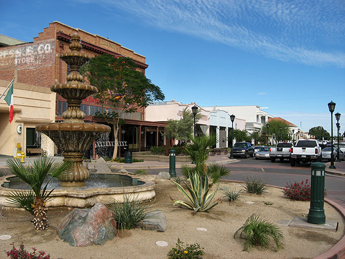 Desert charm meets budget-friendly living in downtown Yuma, where a fountain oasis creates a gathering spot for locals.