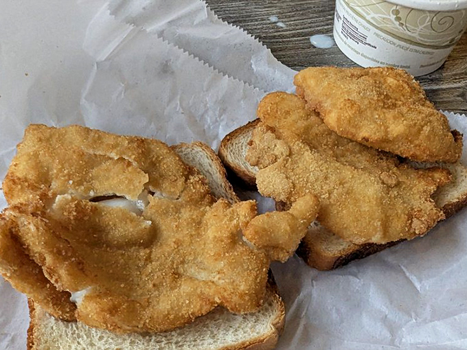 Golden-fried fish spilling over white bread borders&mdash;the sandwich equivalent of a Dolly Parton hairdo: generous, over-the-top, and absolutely perfect.