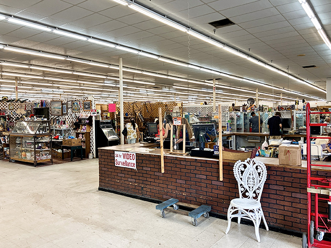 The check-out counter, where dreams and credit cards meet their destiny in this brick-walled gateway between past treasures and future homes.