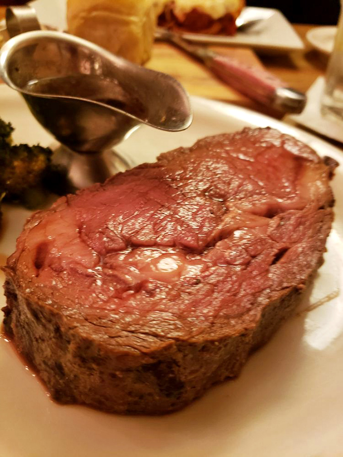 Prime rib perfection on a plate&mdash;so perfectly pink it could make a vegetarian question their life choices. Those roasted potatoes aren't just sidekicks; they're co-stars.