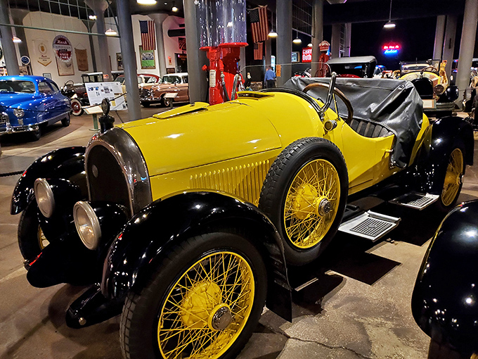 The 1921 Kissel 6-45 Speedster gleams in brilliant yellow, a sunshine-colored reminder that cars were once as much fashion statement as transportation device.