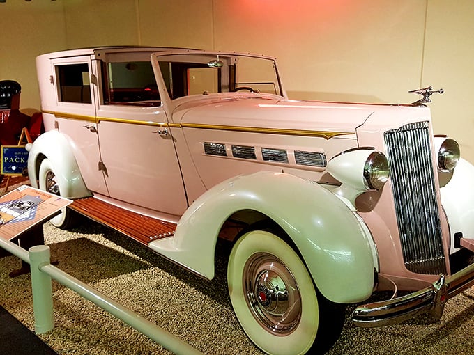 This elegant pink and cream 1937 Packard embodies an era when cars weren't just transportation but rolling sculptures announcing your arrival before you stepped out.