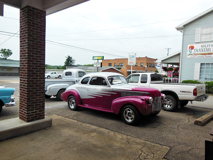 The purple and white 1940 Chevrolet Master Deluxe showcases the art of customization, proving that classic cars are canvases for personal expression.