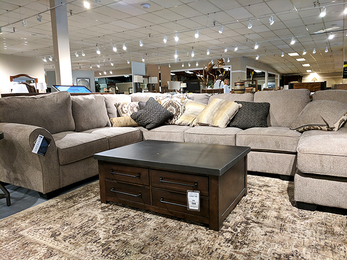 This sectional isn't just a sofa&mdash;it's a commitment to never leaving your living room again. The coffee table's drawers hide all evidence of snacking.