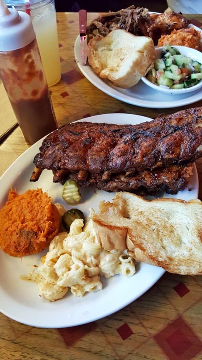 These ribs don't just fall off the bone&mdash;they practically leap onto your fork in slow motion. The bark alone deserves its own fan club.