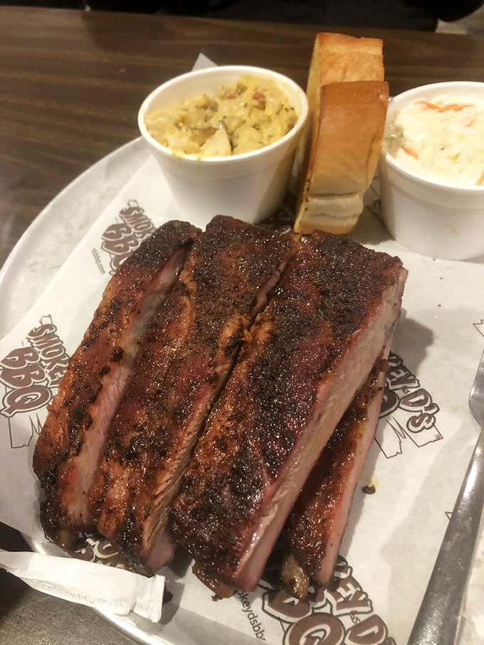 Barbecue perfection doesn't happen by accident. These ribs showcase the pink smoke ring that separates the pitmasters from the pretenders.