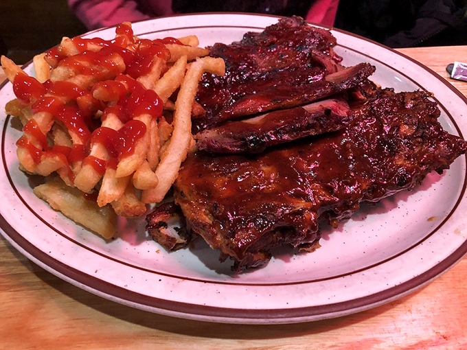 These ribs don't just fall off the bone&mdash;they practically leap into your mouth, leaving behind a trail of sticky, sweet-spicy sauce that demands to be licked from fingers.