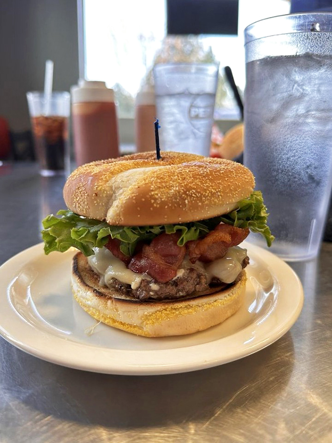 Not all heroes wear capes, but all perfect bacon cheeseburgers wear melty cheese like this one&mdash;a symphony of beef, bacon, and fresh toppings.