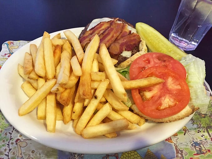 A burger that requires a game plan before attacking. Those golden fries aren't just a side&mdash;they're co-stars in this delicious production of "Lunch: The Musical."