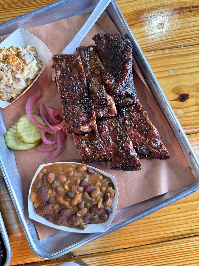 These ribs don't just have a smoke ring&mdash;they have a smoke halo, with perfectly rendered fat and a peppery bark that's worth crossing state lines for.