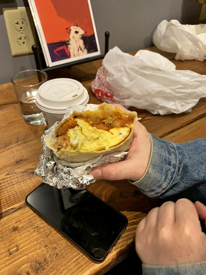 Breakfast burritos should be judged by their cross-section. This one passes with flying colors&mdash;literally. The foil wrapper is just trying to contain the excitement.