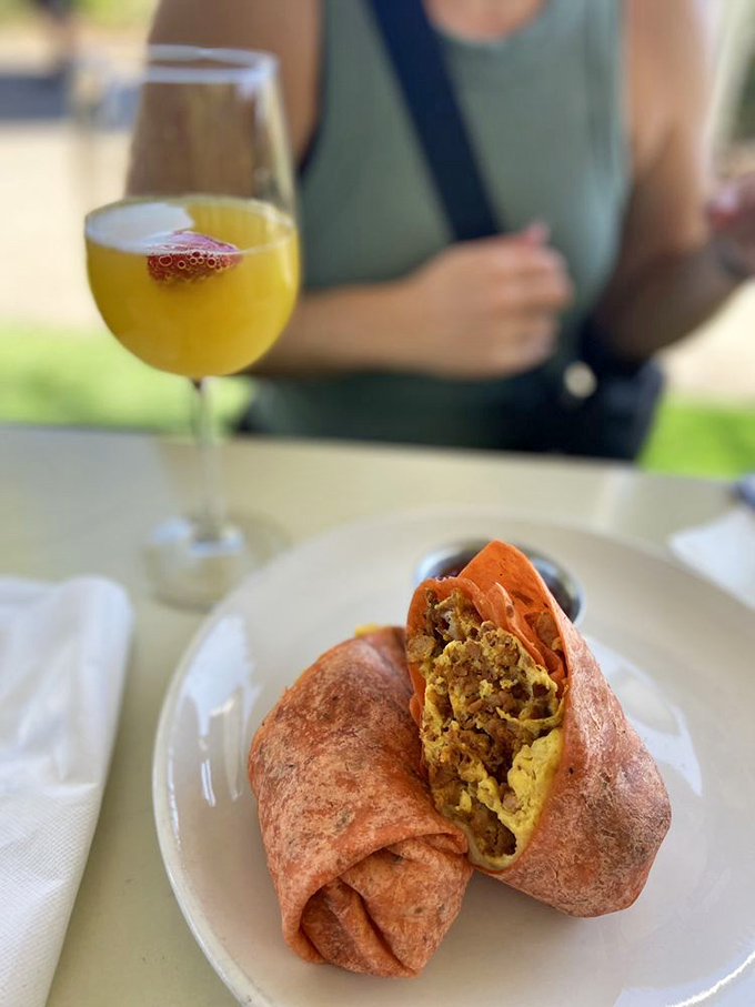 This breakfast burrito isn't just a meal&mdash;it's a hand-held festival of flavors that makes Monday mornings bearable again. Pair with that mimosa for full effect.