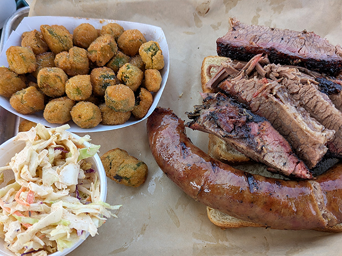 Brisket so tender it practically surrenders to your fork. The mac and cheese isn't a side&mdash;it's a co-headliner in this smoky concert. P