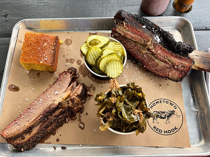 Meat paradise found! This tray showcases the holy trinity of barbecue&mdash;brisket with that perfect smoke ring, sausage with snap, and ribs that surrender at first bite.