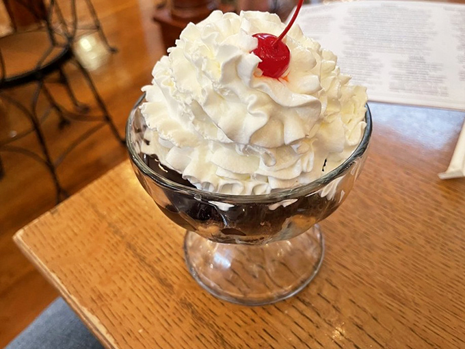 Mount Whipped Cream with a cherry flag on top! This brownie sundae isn't dessert &ndash; it's an expedition worth every delicious step.