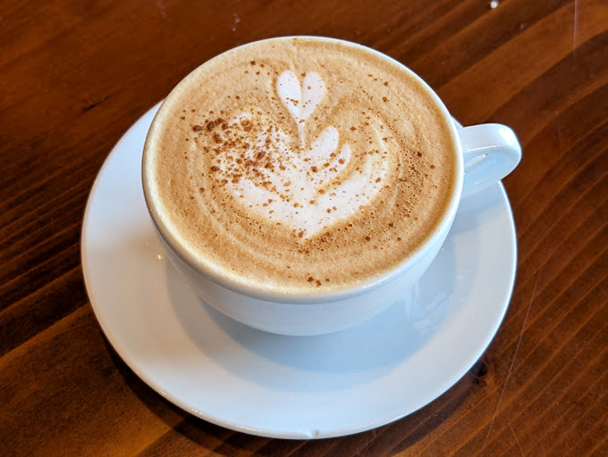 This isn't just a cappuccino; it's a masterclass in foam architecture with a heart design that says, "Someone actually cares about your morning."